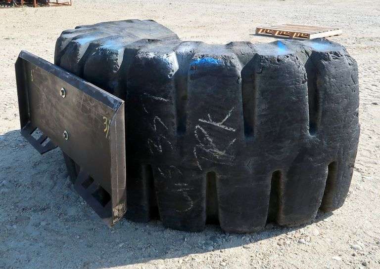 F-735 Skid Steer Pusher Tire - Pickett Auction Service