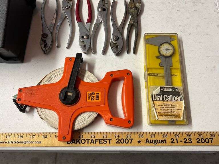 Pliers, caliper, 30m tape - Peterson Land & Auction LLC