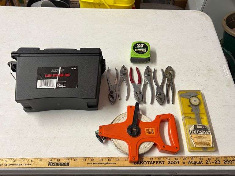 Pliers, caliper, 30m tape - Peterson Land & Auction LLC
