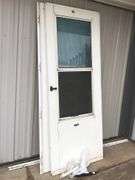 2 Used Storm Doors - Peterson Land & Auction LLC