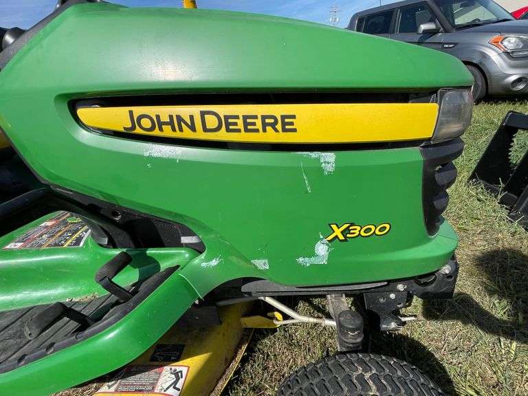 John Deere X300 Lawn Tractor - Property Peddler