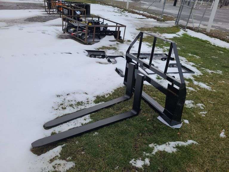 Mower King SA Skid loader Forks - Rogers Community Auction Inc.