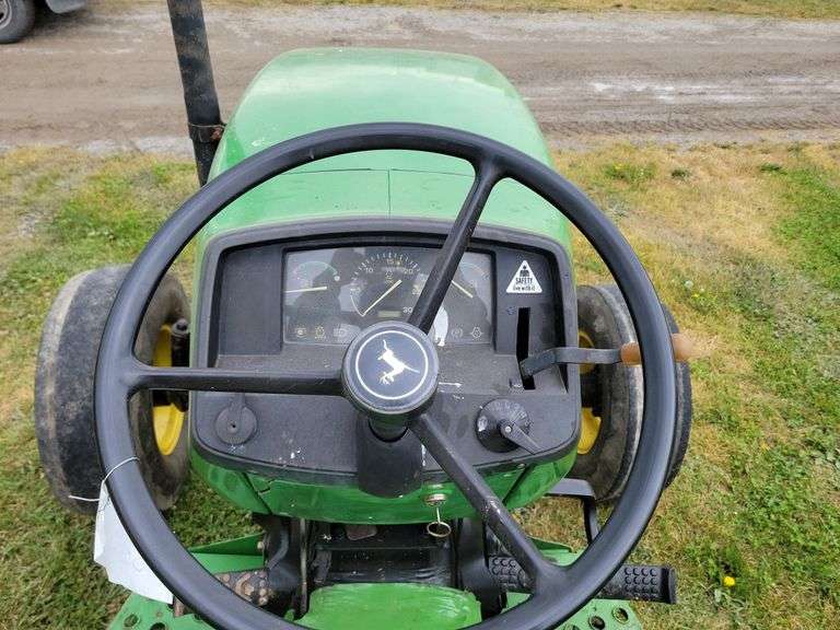 John Deere 5210 Sync Shuttle Diesel Tractor - Rogers Community Auction Inc.