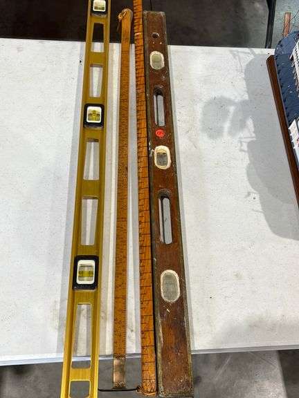 Levels & Lumber Measuring Sticks - RES Auction Services
