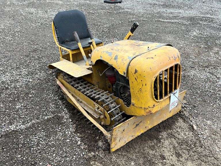 "ABSOLUTE" Homemade Yellow Mini Dozer - RES Auction Services
