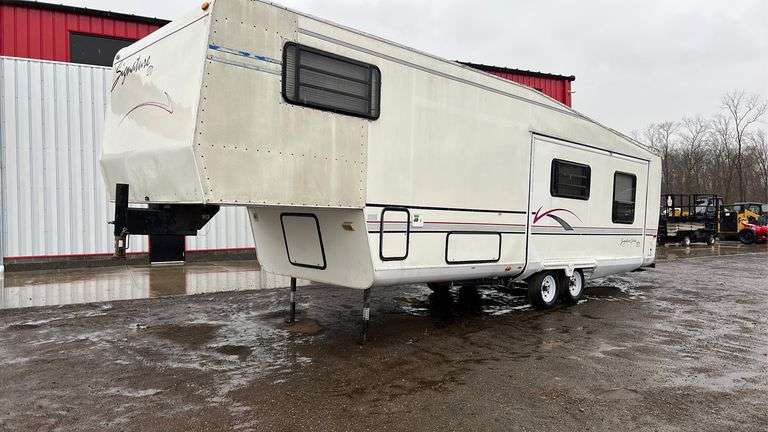 "ABSOLUTE" 1996 Dutchman Signature 34' Camper - RES Auction Services