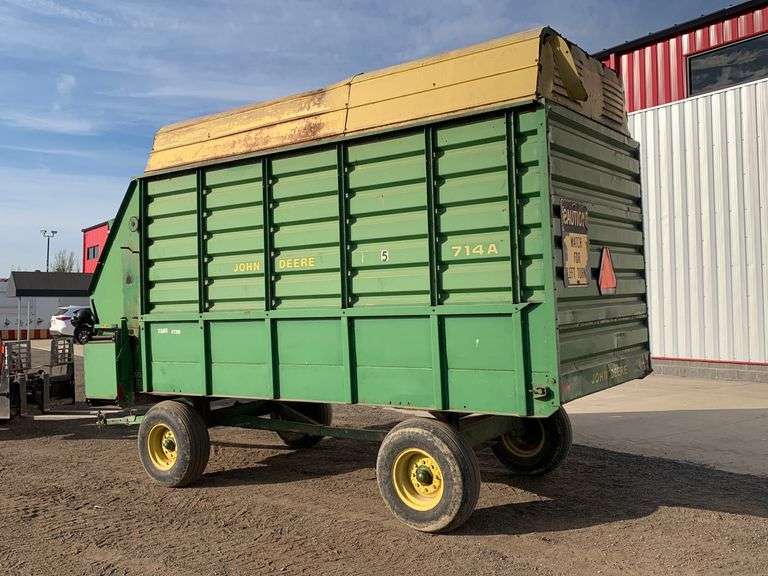 "ABSOLUTE" John Deere 714A Forage Wagon - RES Auction Services