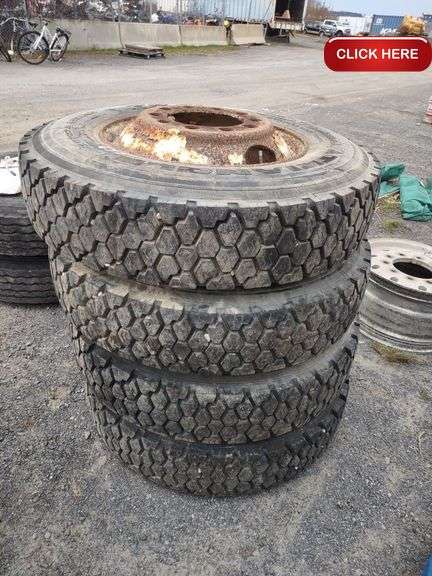 4- 10r- 22.5 tires on rims - Rideau Auctions