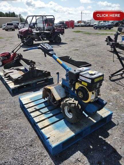 Ford -09gn 1114 gas rotary tiller - Rideau Auctions