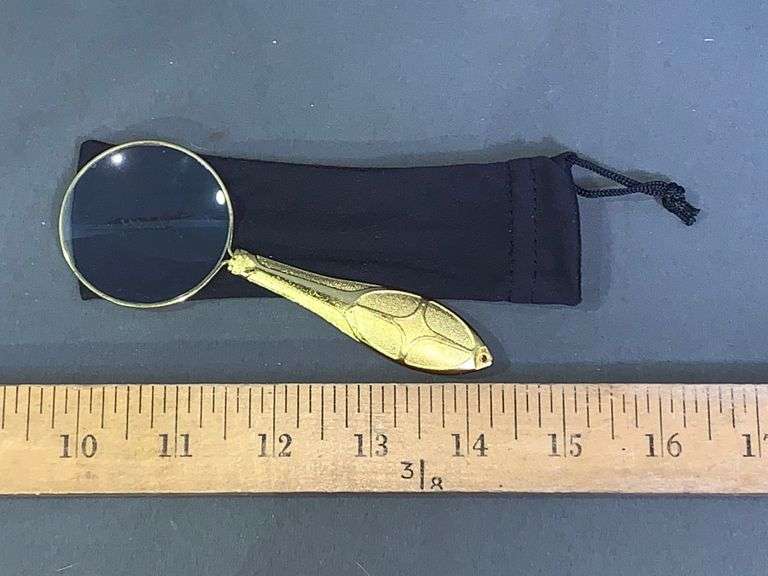 New Gold Finish 5X Hand Magnifier. - Rocky Mountain Estate Brokers Inc.