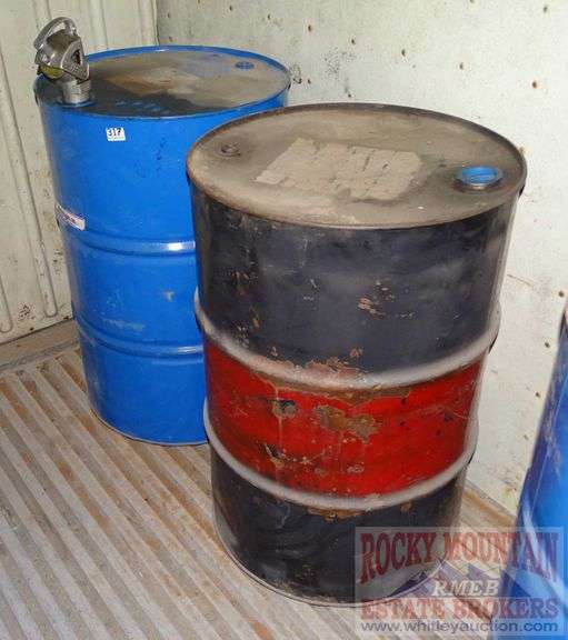 2 Empty Metal 55 Gallon Drums with one locking spout. Both for one ...