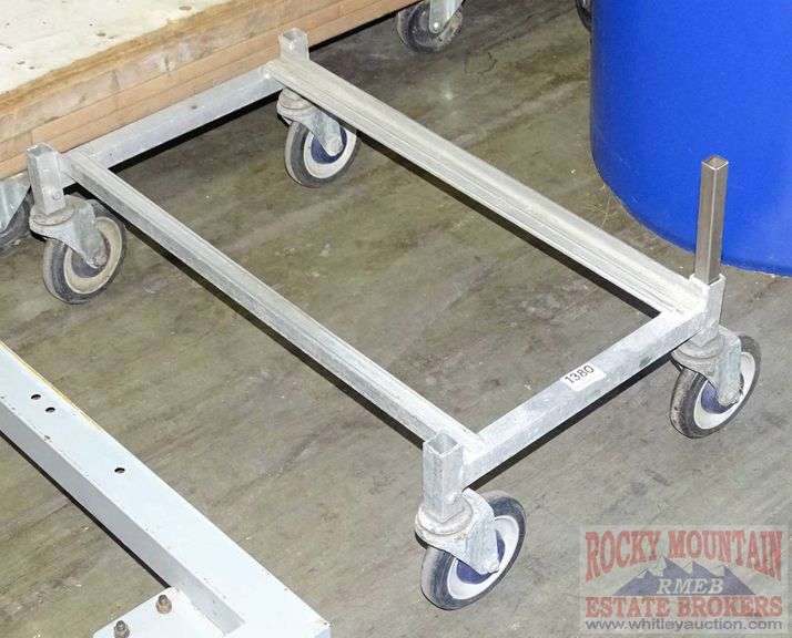 Heavy duty 4-wheel cart-dolly. - Rocky Mountain Estate Brokers Inc.