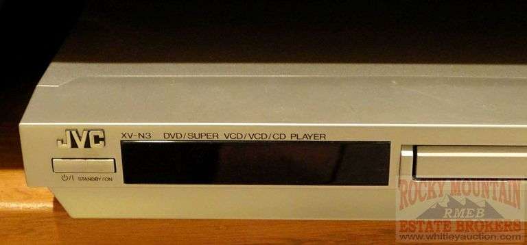 JVC DVD/Super VCD/VCD/CD player. - Rocky Mountain Estate Brokers Inc.