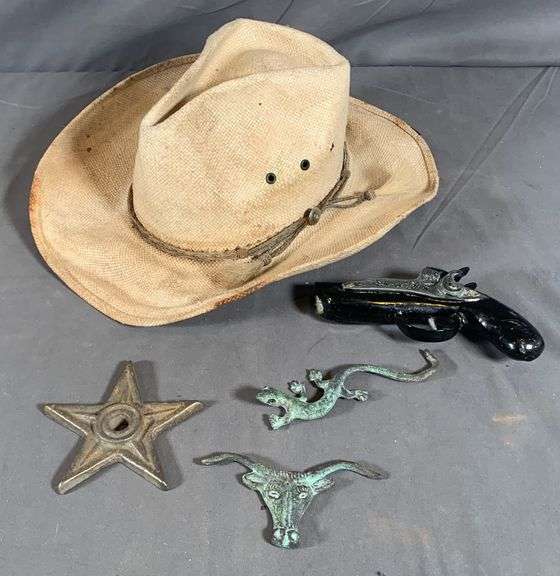 Neat worn Charlie Hoover cowboy hat, decorative black powder pistol ...