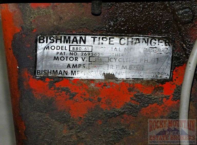 Bishman 880-61 tire machine. - Rocky Mountain Estate Brokers Inc.