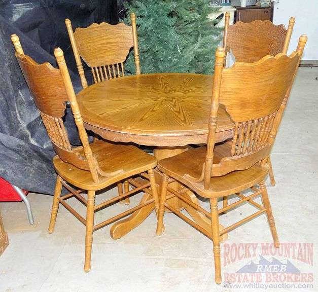 42" Round oak Single pedestal dining table with 4 double pressed back ...