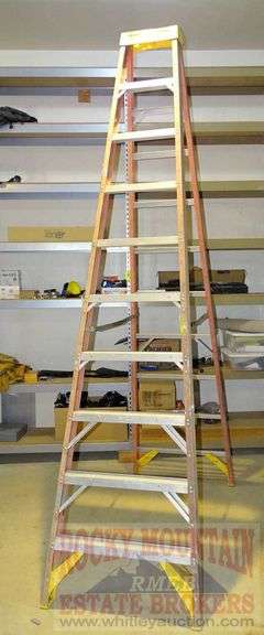 10' fiberglass step ladder. - Rocky Mountain Estate Brokers Inc.