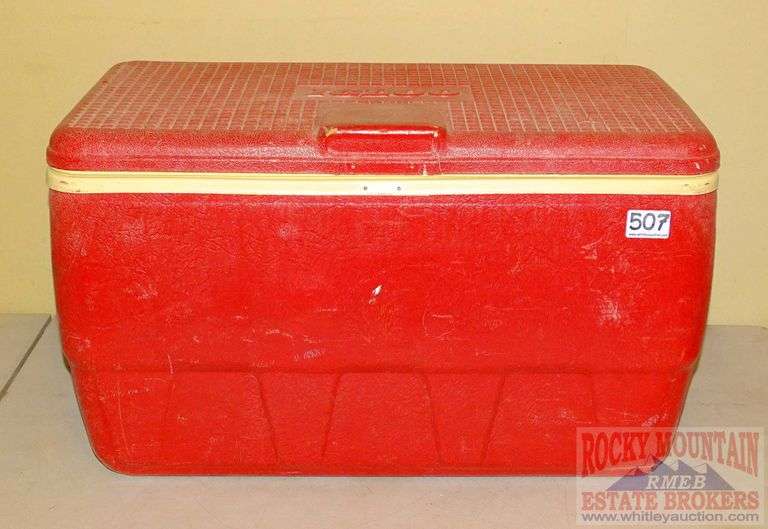 Red Igloo cooler. - Rocky Mountain Estate Brokers Inc.