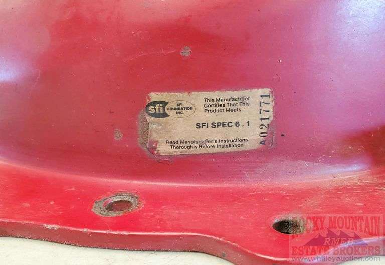 Red bell housing. Appears to be explosion proof. Tag says SFI SPEC 6. 1 ...