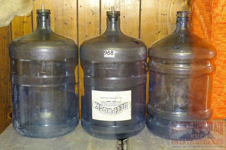 3 plastic 5 gallon water bottles. Three times the money. Total bid is ...