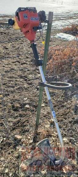 Homelite gas powered string trimmer. - Rocky Mountain Estate Brokers Inc.