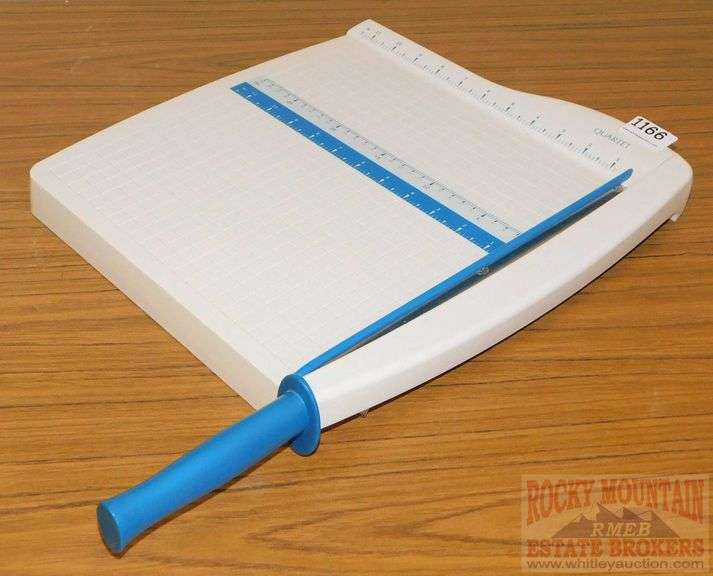 Quartet 12" paper cutter. - Rocky Mountain Estate Brokers Inc.