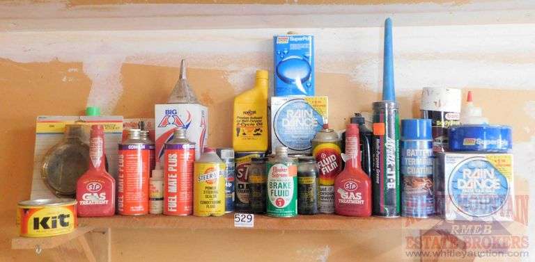 Partial containers of oil, brake fluid, STP gas treatment, car cleaning ...