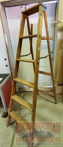 6' wooden step ladder. - Rocky Mountain Estate Brokers Inc.
