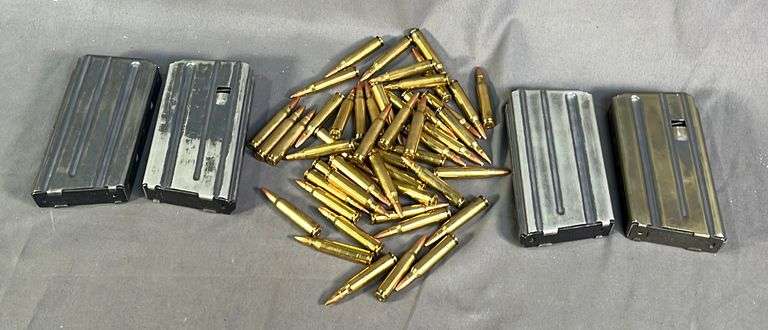 4 Vintage M16/M16A1 5.56mm Magazines. One magazine has cartridges & an ...