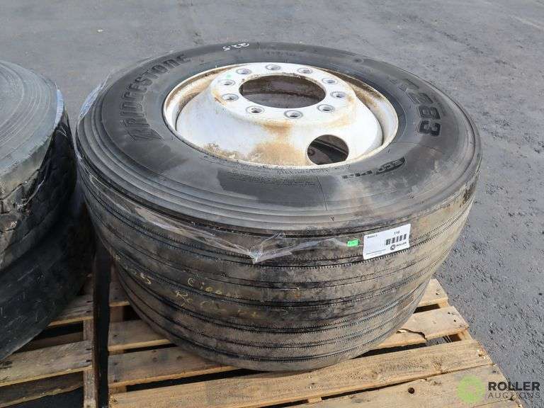 (2) Bridgestone R283 11R22.5 Tires With Wheels - Roller Auctions