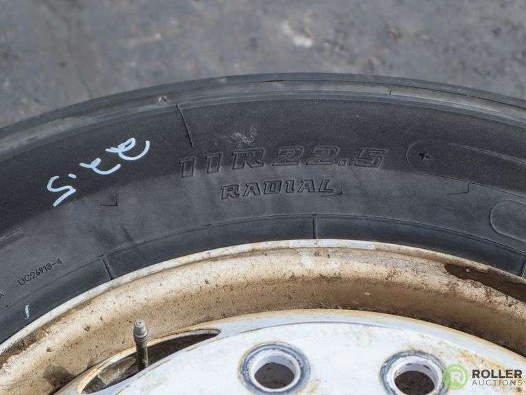 (2) Bridgestone R283 11R22.5 Tires With Wheels - Roller Auctions
