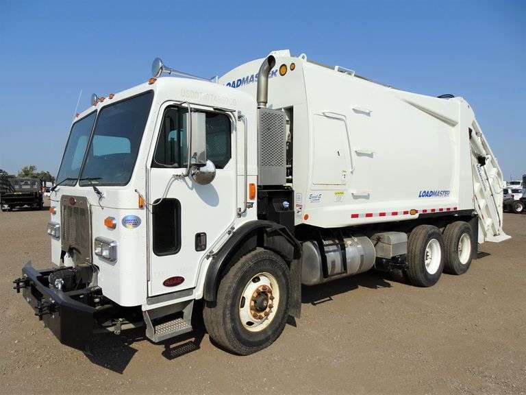 City of Northglenn 2014 Peterbilt 320 Loadmaster Trash Truck - Roller ...
