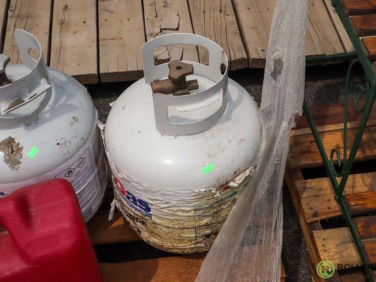 Pallet of Propane Tanks and Gas Cans - Roller Auctions