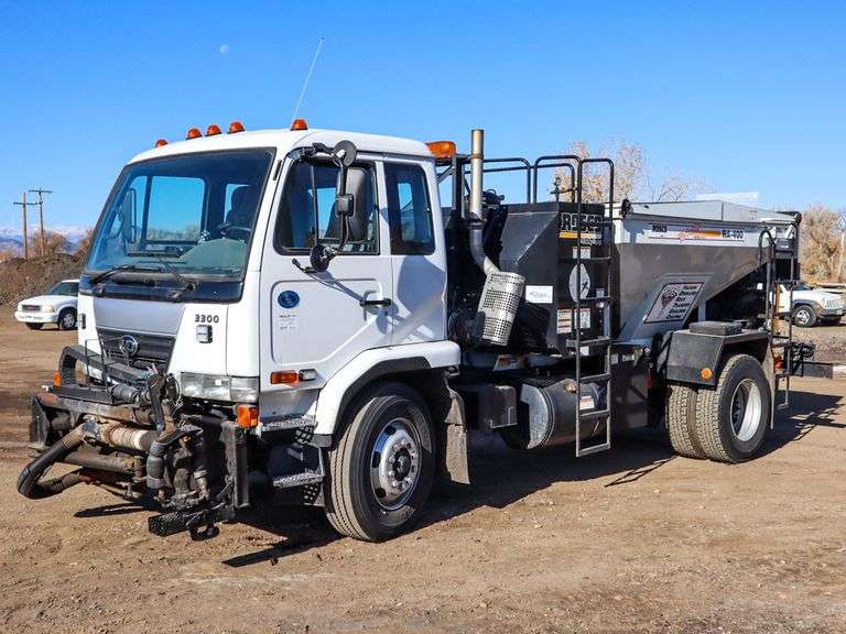 2010 NISSAN 3300 S/A POTHOLE TRUCK, 6-Cylinder Diesel, Automatic, Rosco ...