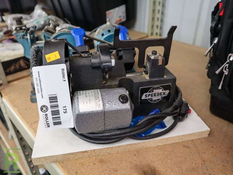 (2) Key Cutting Machines; (1) Speedex 9120RM - Roller Auctions