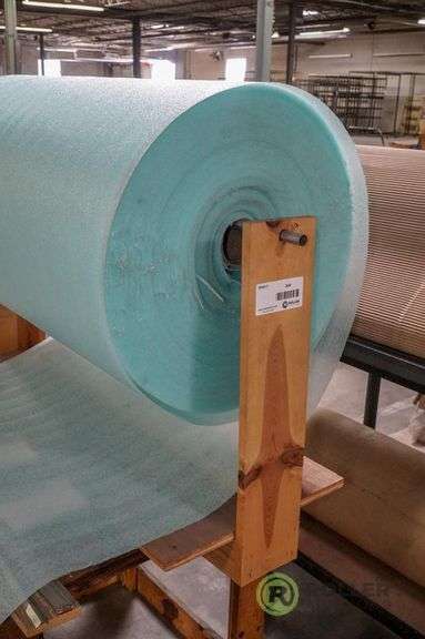 Roll of Shipping Styrofoam and Wood Stand - Roller Auctions
