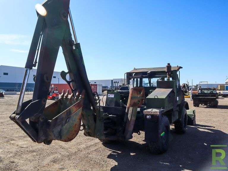 Unimog 419 Loader/Backhoe - Roller Auctions