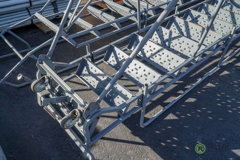 (2) 14' Rolling Warehouse Ladders (Damaged) - Roller Auctions