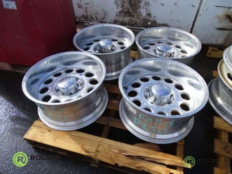 (4) Eagle 8-Hold Rims - Roller Auctions
