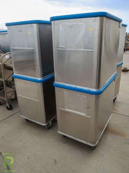 (2) Spring Loaded Carts - Roller Auctions