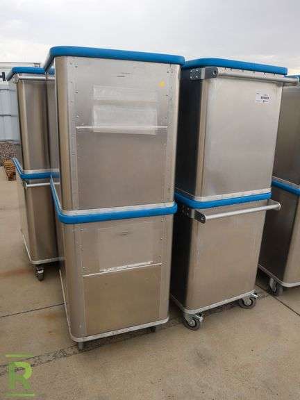 (2) Spring Loaded Carts - Roller Auctions