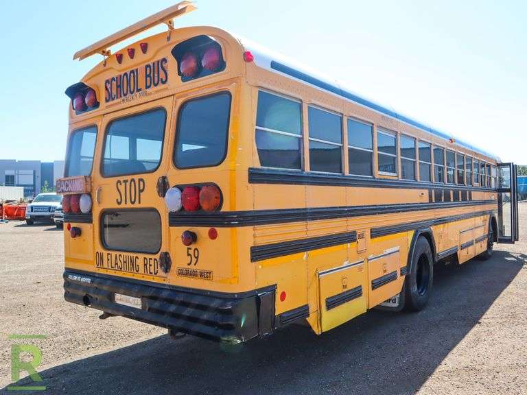 1999 Blue Bird TC2000 RWD 77-Passenger School Bus - Roller Auctions
