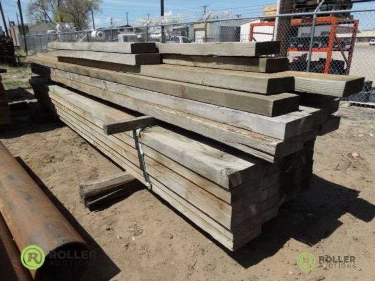 Large Group of 4in x 12in x 20' Lagging Boards - Roller Auctions