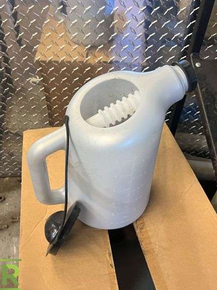 Oil Can Stand - Roller Auctions