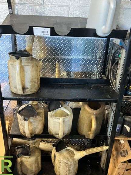 Oil Can Stand - Roller Auctions