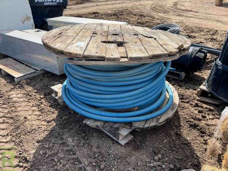Spool Of Plastic Hose - Roller Auctions