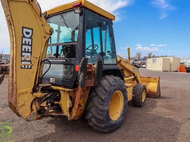 1997 John Deere 310E 4WD Loader/Backhoe - Roller Auctions