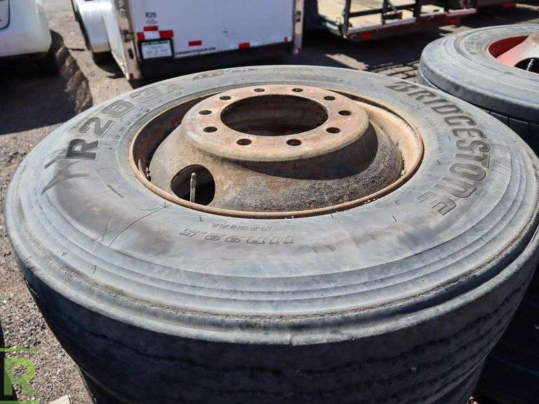 Set of (4) 22.5 Low Pro Truck Tires with Bud Wheels - Roller Auctions
