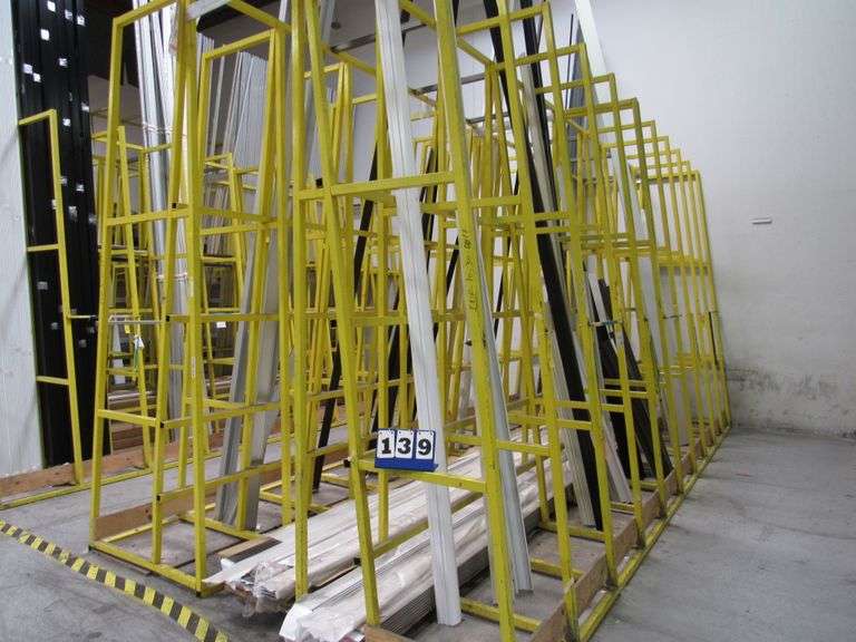 HEAVY DUTY YELLOW METAL STORAGE RACK, EMPTY, APPROXIMATELY 10' X 40" X ...