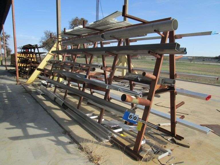 STEEL STOCK RACK, APPROX. 19' X 6' X 8' TALL, WITH CONTENTS INCLUDING ...